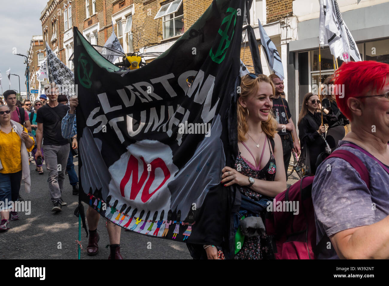 London, UK. 13th July 2019. Extinction Rebellion march from Hackney ...