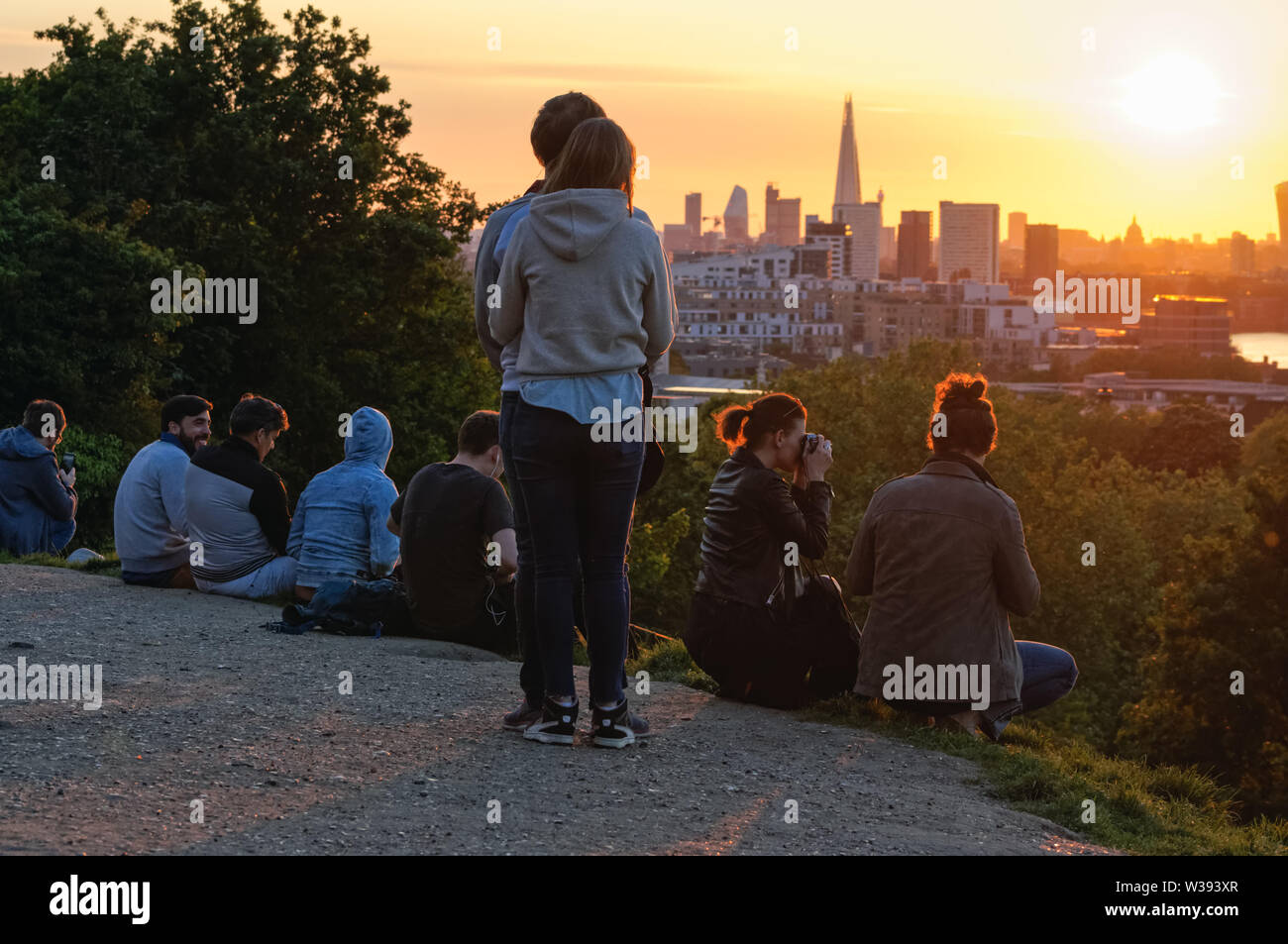 Watching sunset uk hi-res stock photography and images - Alamy