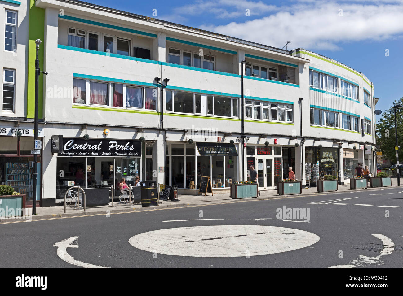 A row of 1930s shops in Weston-super-Mare, UK. The glass canopy which ...