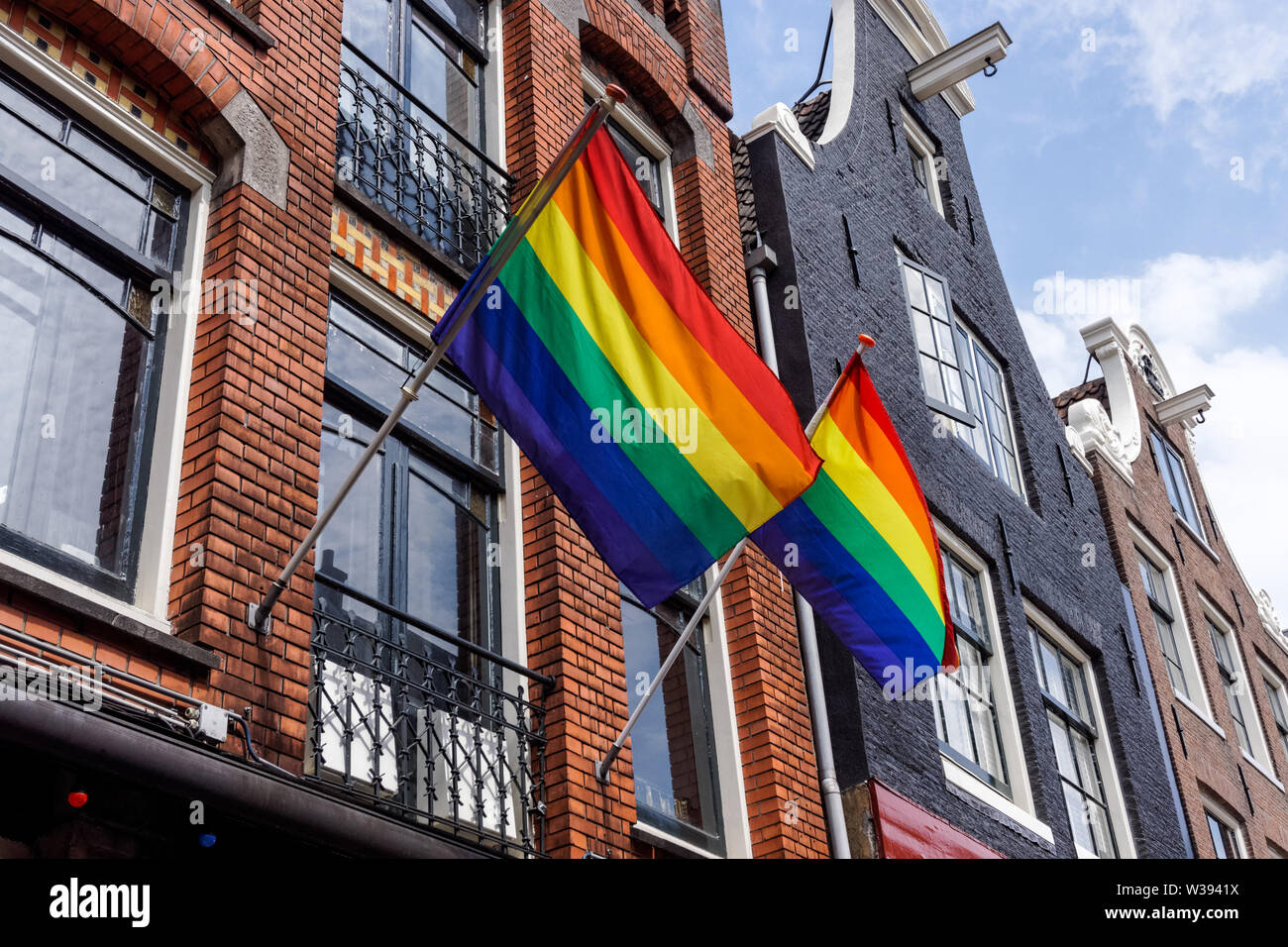 Gay rainbow flags at the entrance to gay club in Reguliersdwarsstraat ...