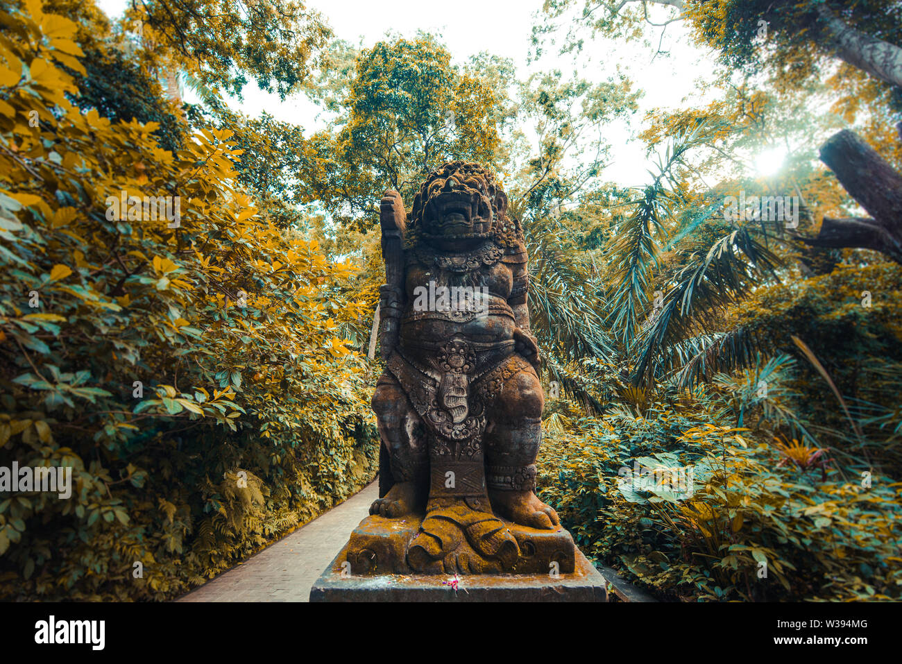 Statue in the sacred Monkey Forest, Ubud, Bali, Indonesia Stock Photo ...