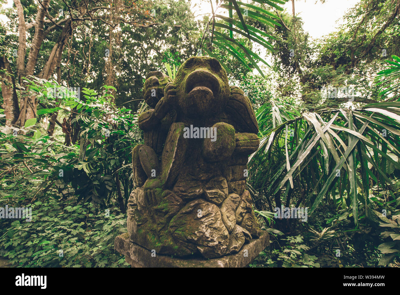 Statue in the sacred Monkey Forest, Ubud, Bali, Indonesia Stock Photo ...