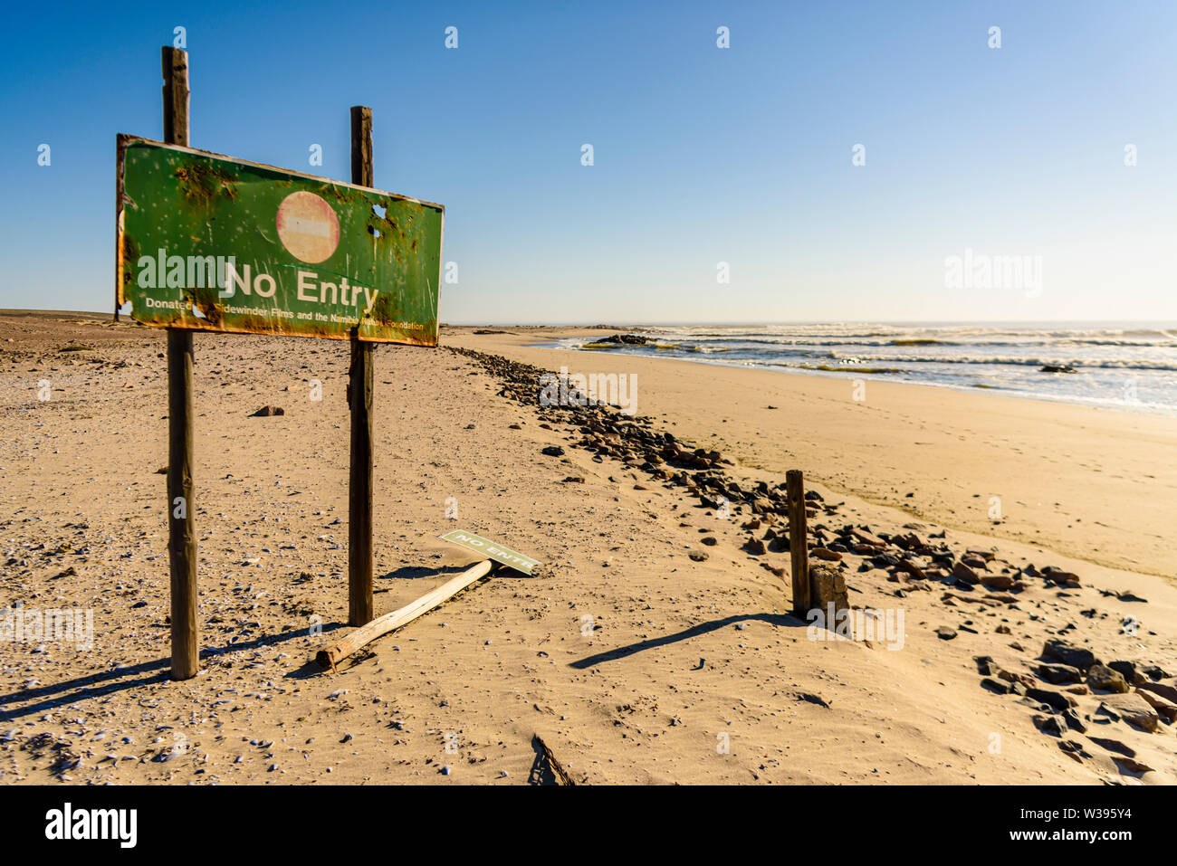 No entry sign on the beach at Cape Cross seal colony, Skeleton Coast ...