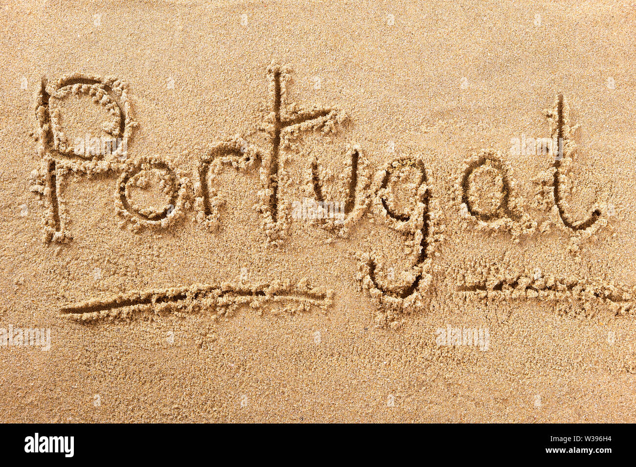 Portugal algarve beach word travel writing concept Stock Photo - Alamy