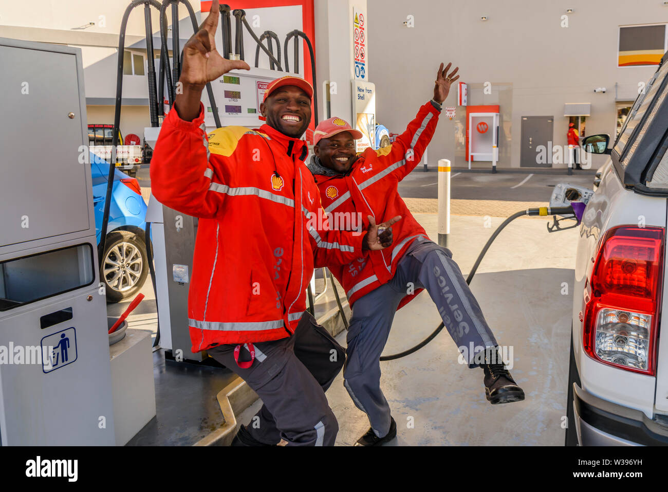 Petrol station attendants hi-res stock photography and images - Alamy