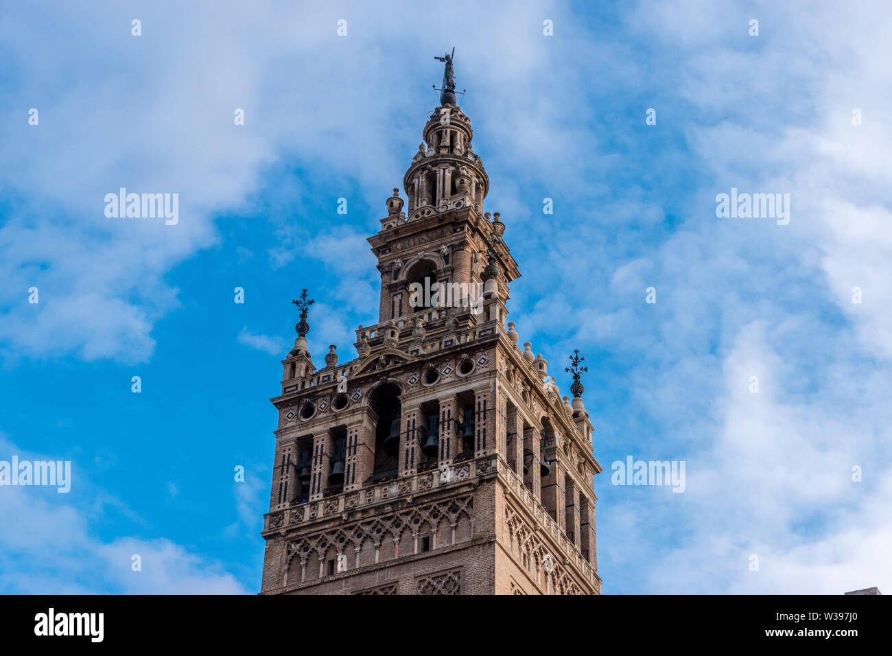 The Giralda is a bell tower of Seville Cathedral in Spain. It was built ...
