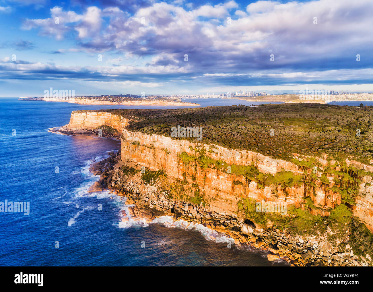 Steep sandstone cliffs of Sydney North Head at the entrance to Sydney ...