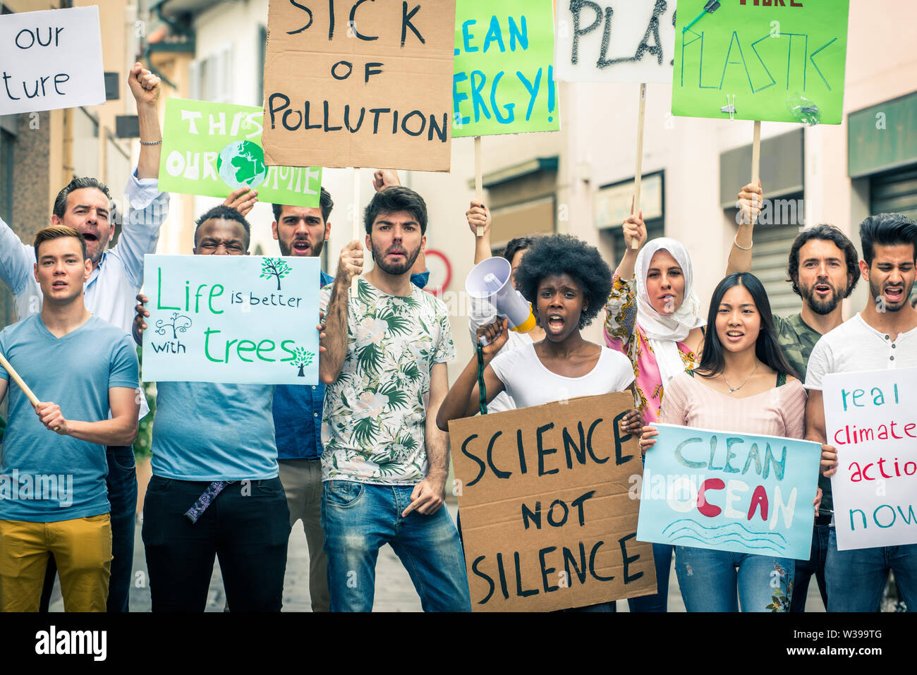 Group of activists is protesting outdoors - Crowd demonstrating against ...