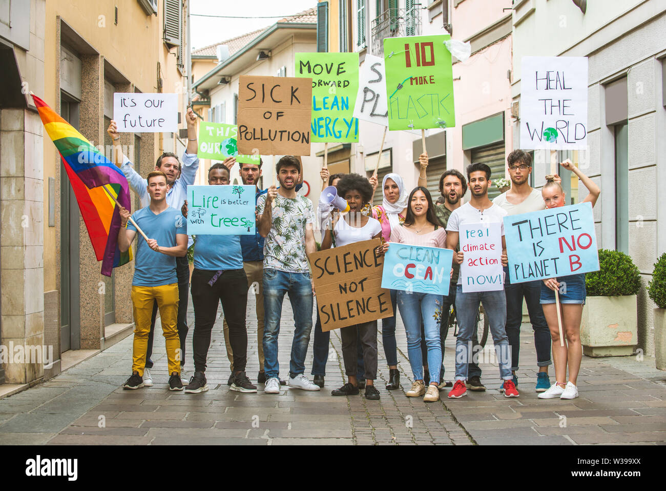 Group of activists is protesting outdoors - Crowd demonstrating against ...