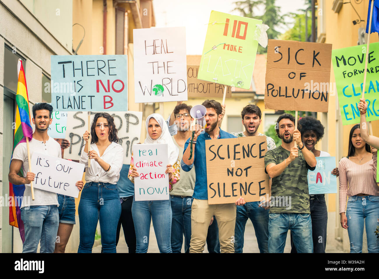 Group of activists is protesting outdoors - Crowd demonstrating against ...