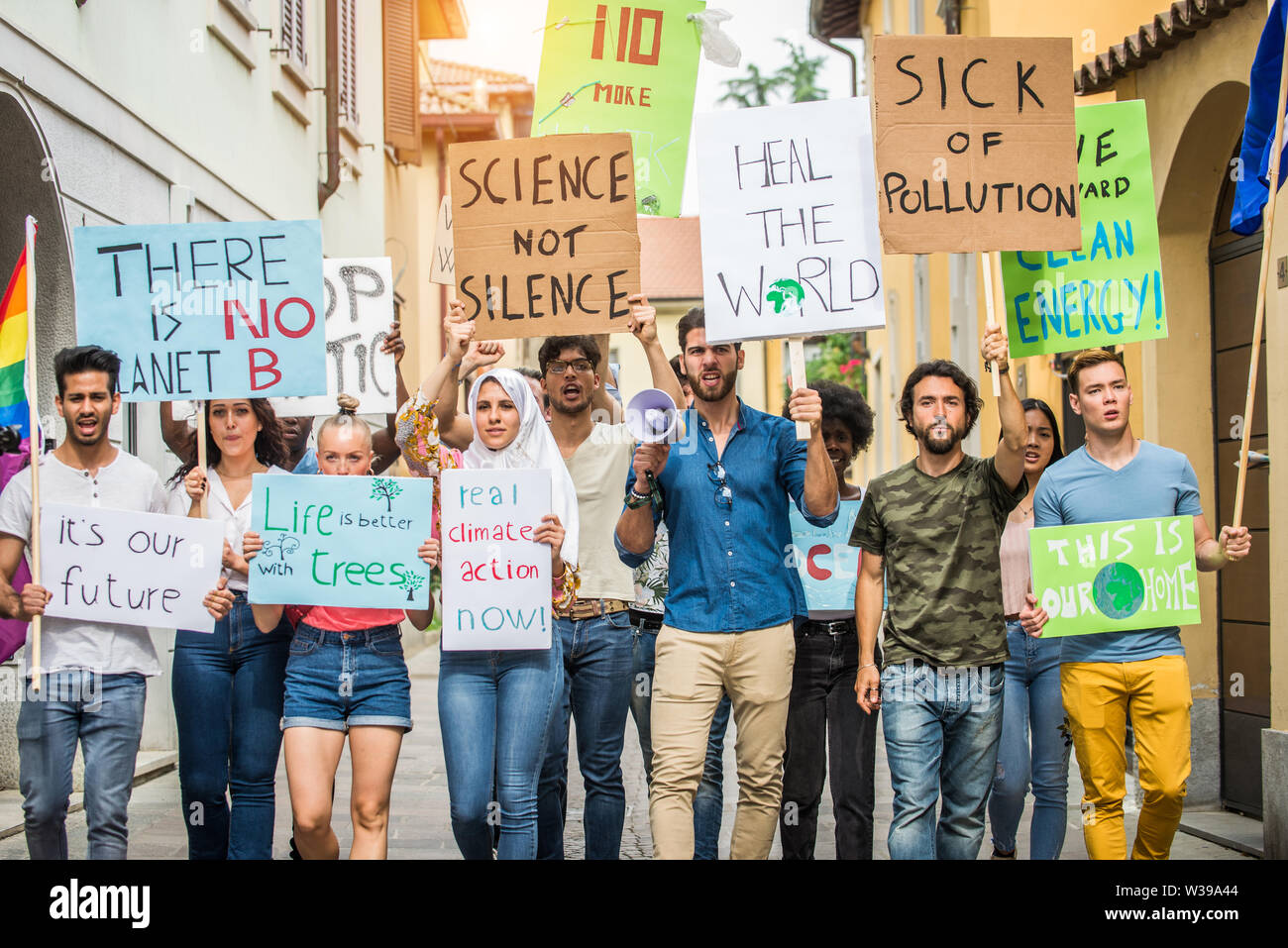 Group of activists is protesting outdoors - Crowd demonstrating against ...