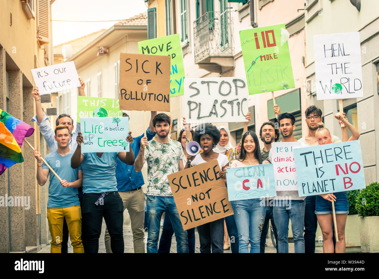 Group of activists is protesting outdoors - Crowd demonstrating against ...