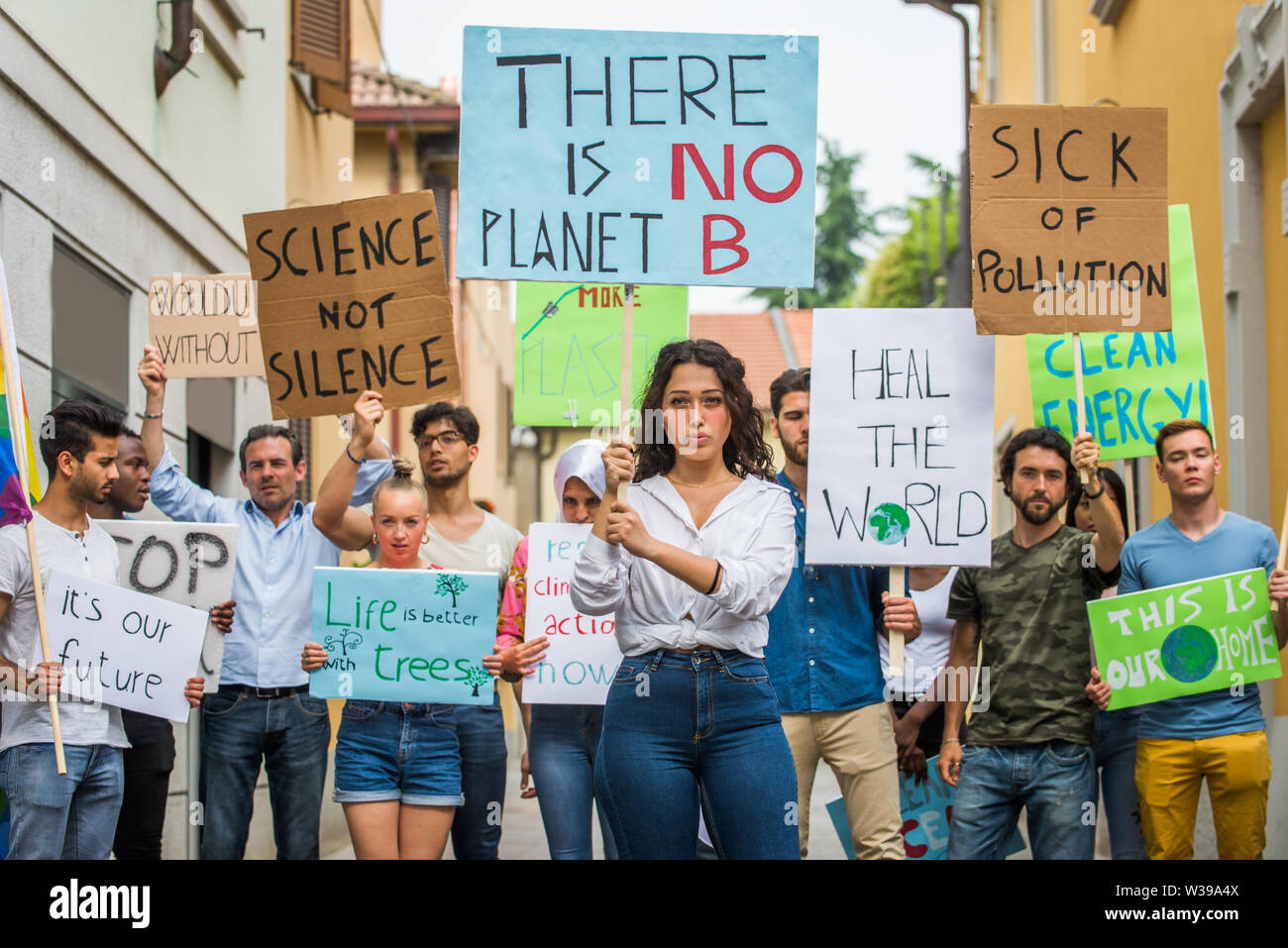 Group of activists is protesting outdoors - Crowd demonstrating against ...