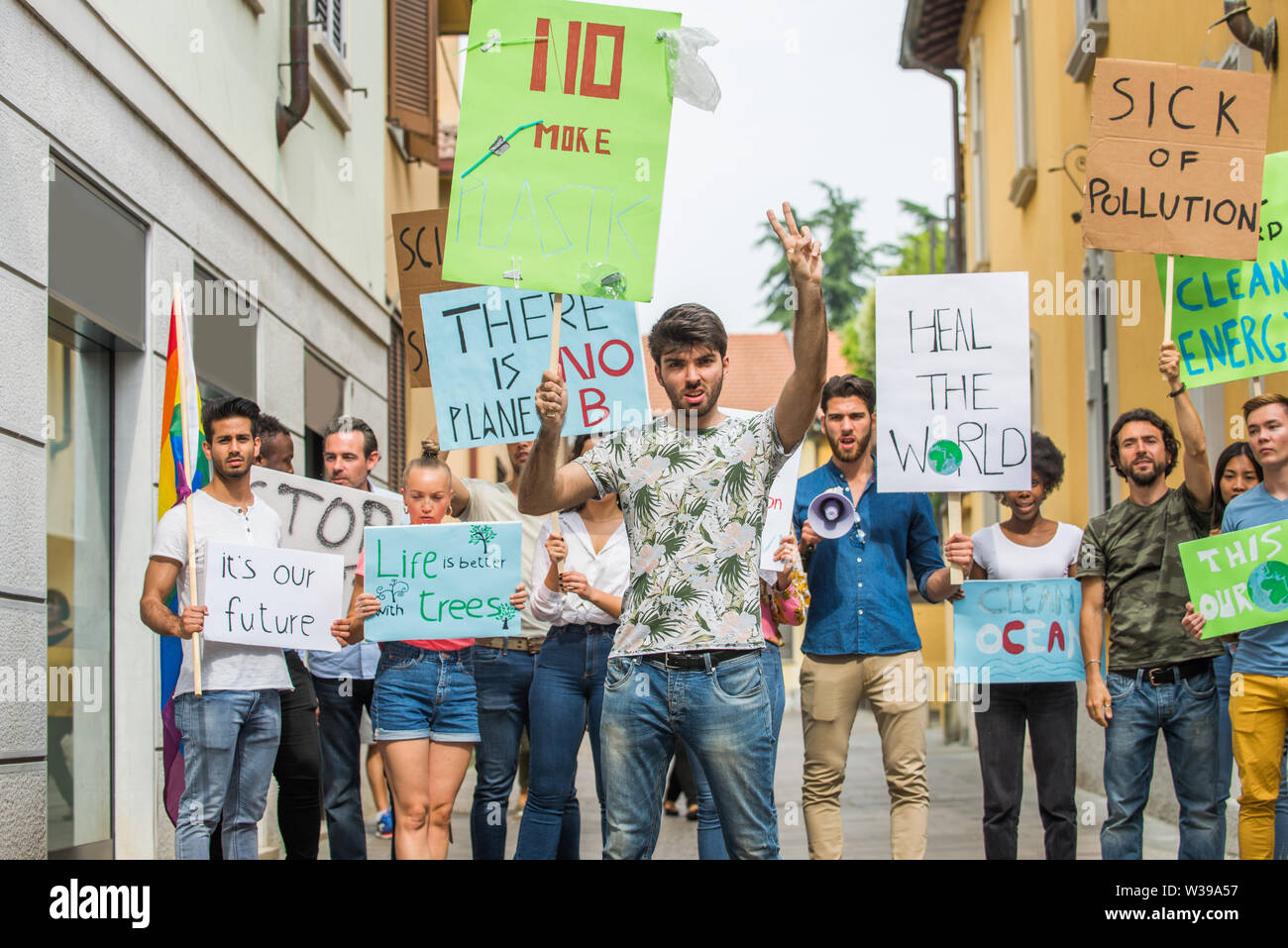 Group of activists is protesting outdoors - Crowd demonstrating against ...