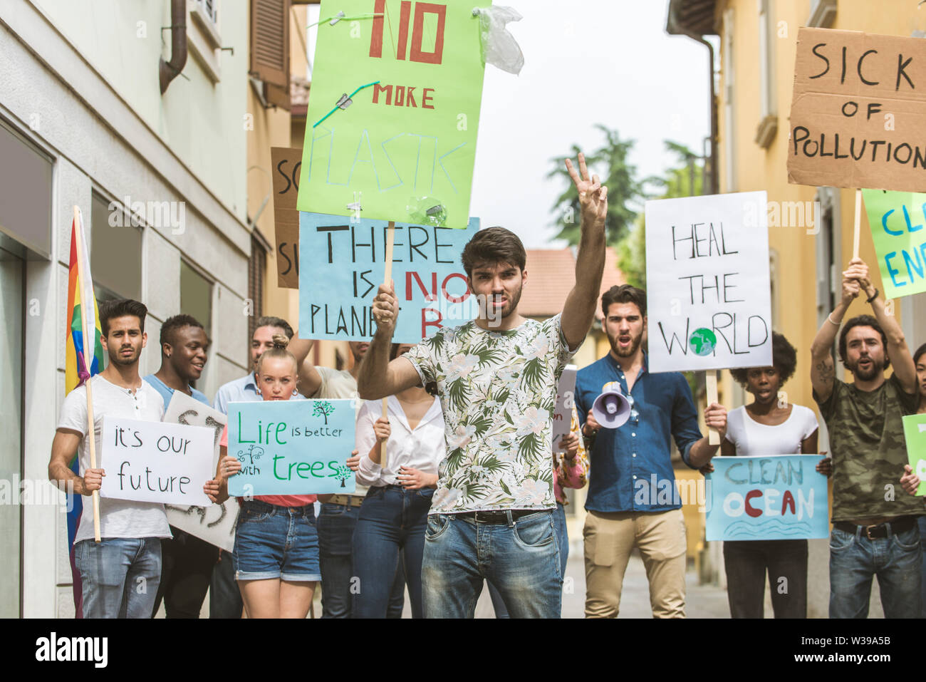 Group of activists is protesting outdoors - Crowd demonstrating against ...