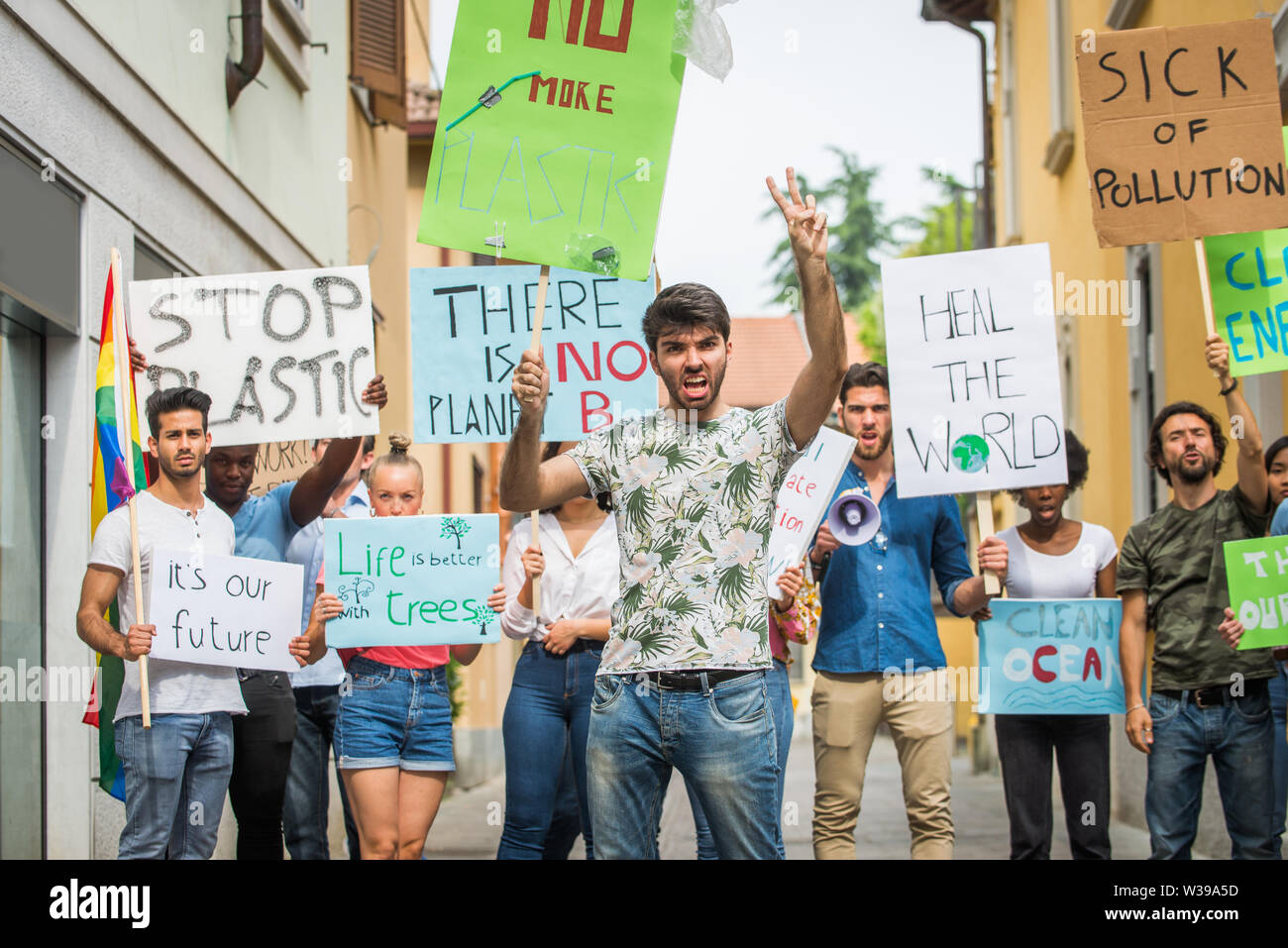 Group of activists is protesting outdoors - Crowd demonstrating against ...