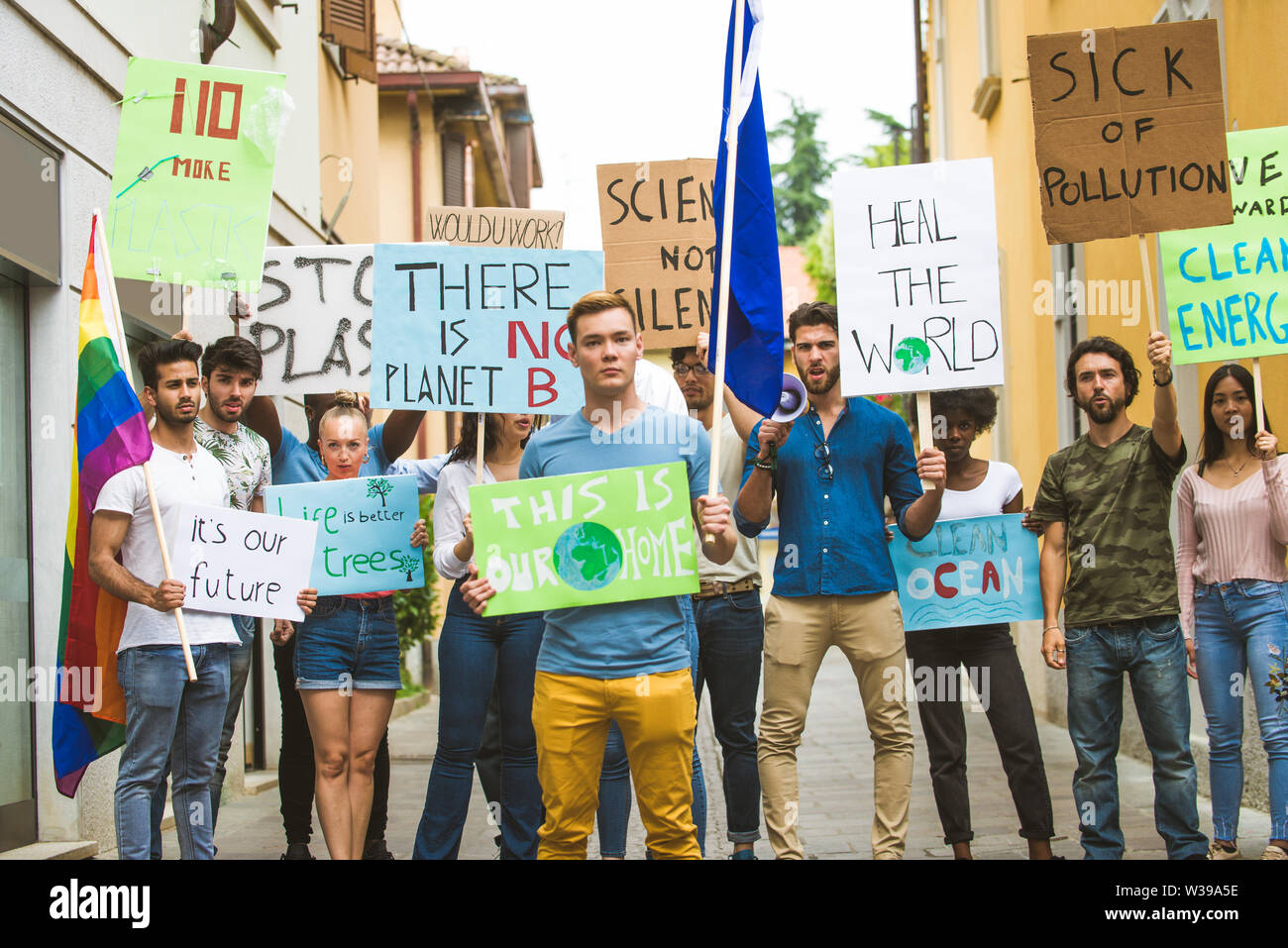 Group of activists is protesting outdoors - Crowd demonstrating against ...