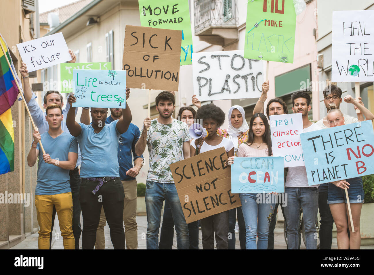 Group of activists is protesting outdoors - Crowd demonstrating against ...