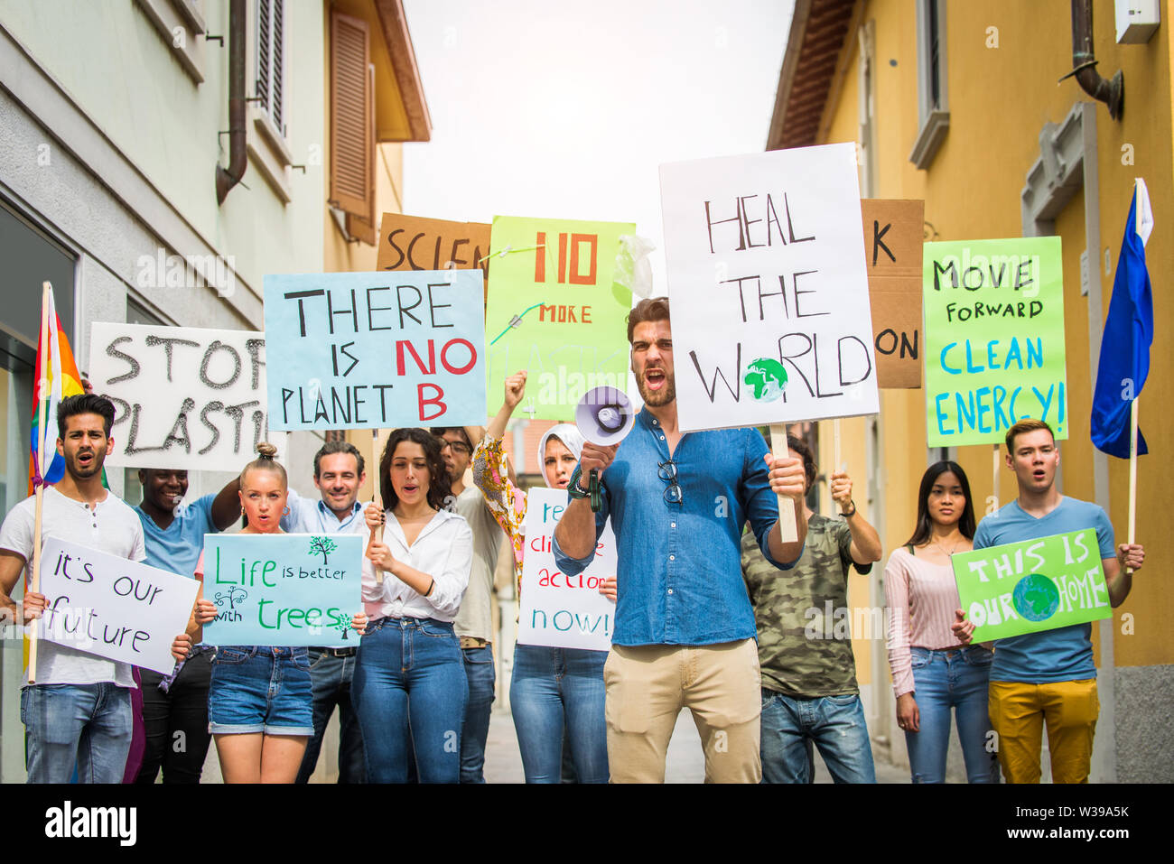 Group of activists is protesting outdoors - Crowd demonstrating against ...