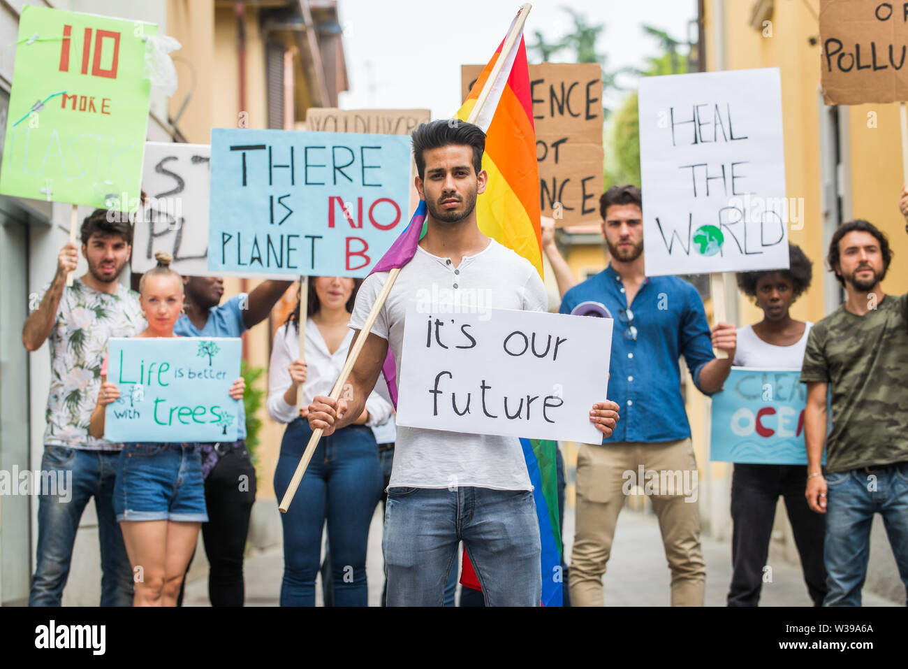 Group of activists is protesting outdoors - Crowd demonstrating against ...