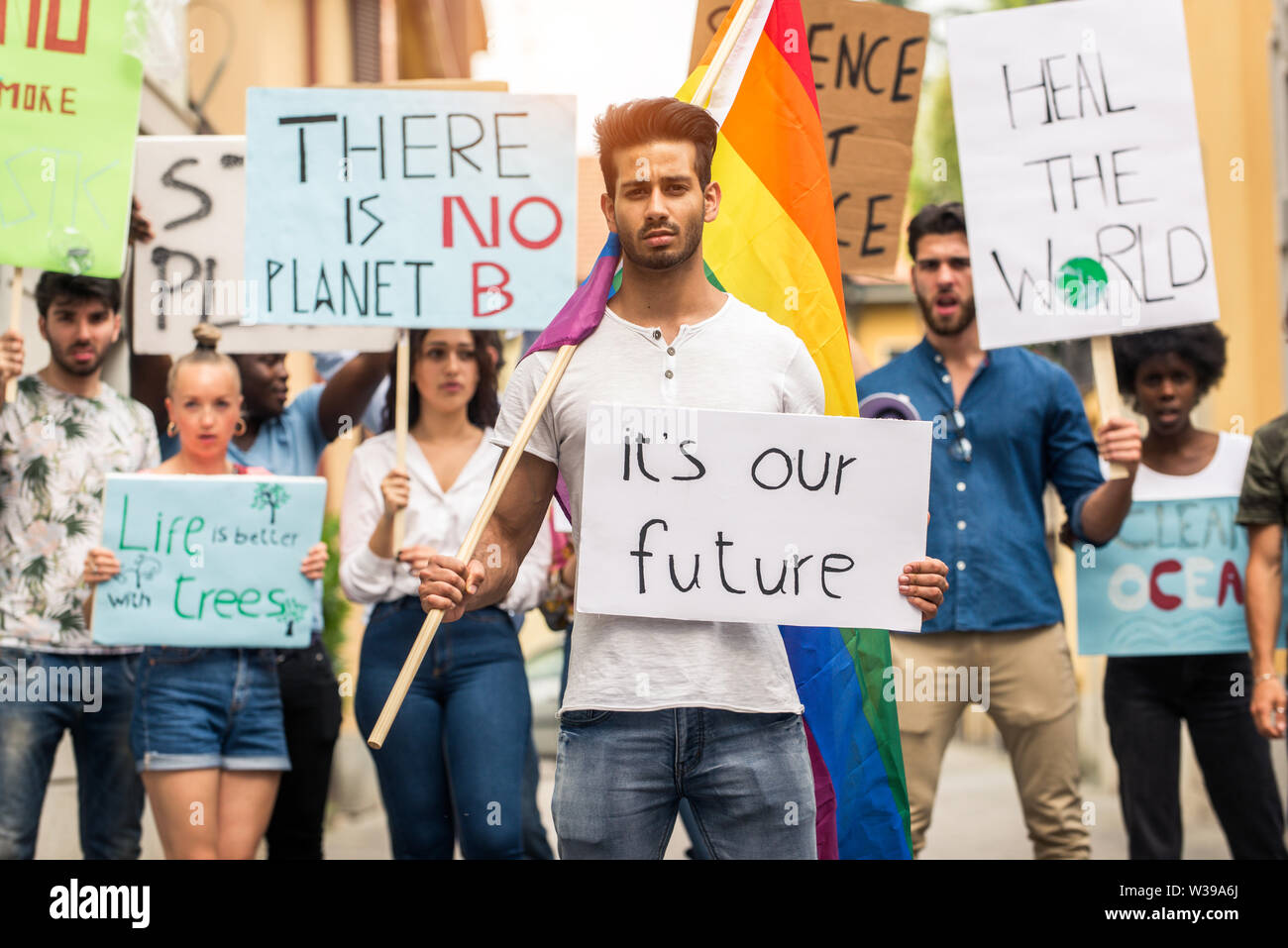 Group of activists is protesting outdoors - Crowd demonstrating against ...