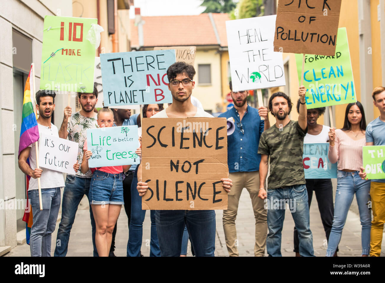 Group of activists is protesting outdoors - Crowd demonstrating against ...