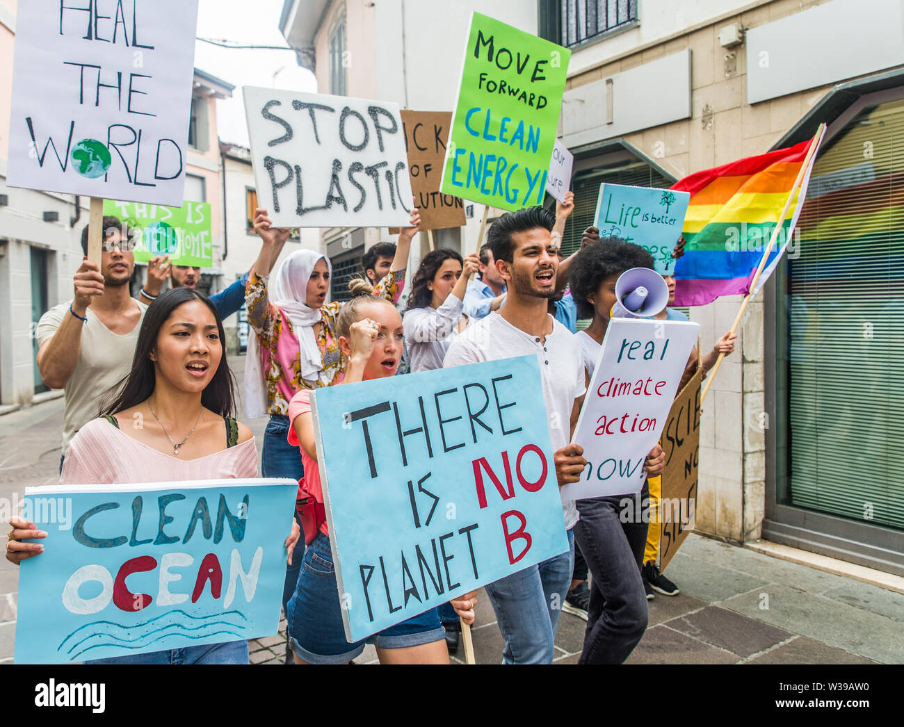 Group of activists is protesting outdoors - Crowd demonstrating against ...