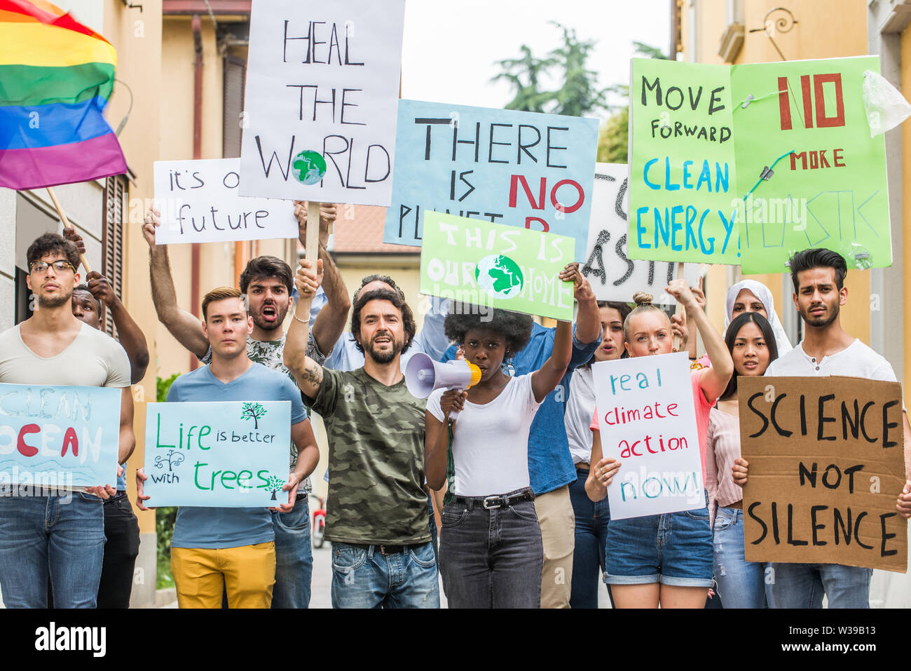 Group of activists is protesting outdoors - Crowd demonstrating against ...