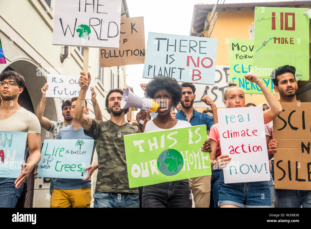 Group of activists is protesting outdoors - Crowd demonstrating against ...
