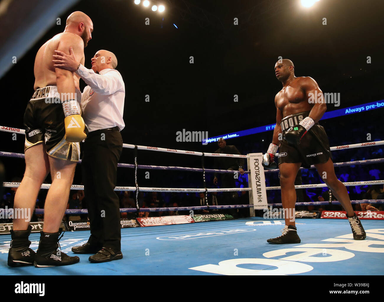 The referee stops the fight between Daniel Duboisat (right) and Nathan ...