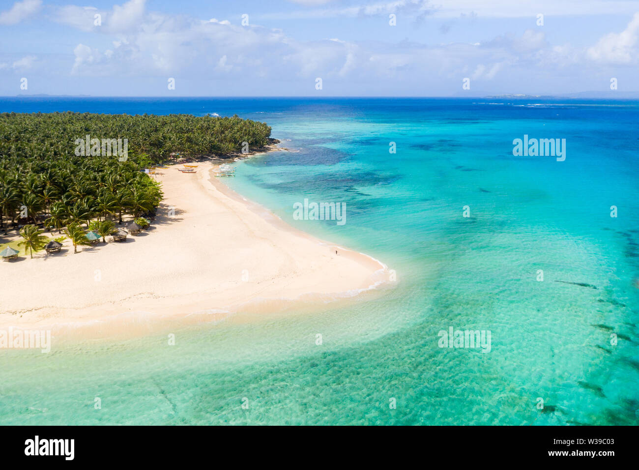 Daku Island, Siargao, Philippines - Tropical beach with blue water and ...