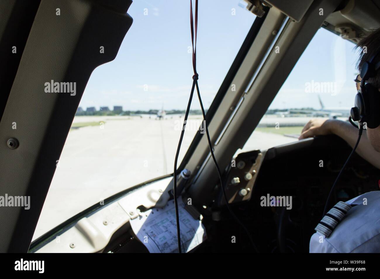 Airplane cabin crew cockpit hi-res stock photography and images - Alamy