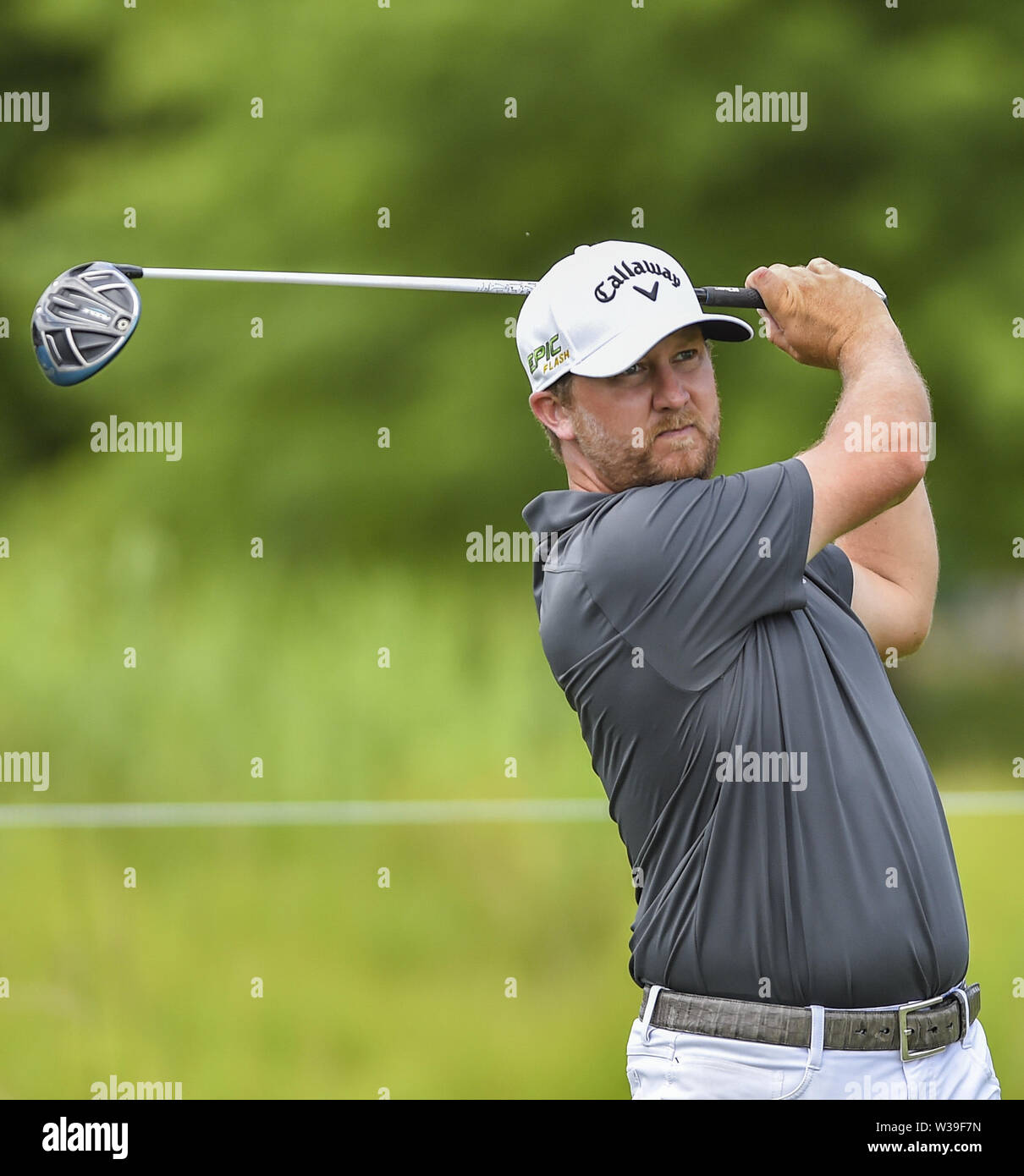 Iowa, USA. 11th July, 2019. PGA golfer Brice Garnett tees off on the ...