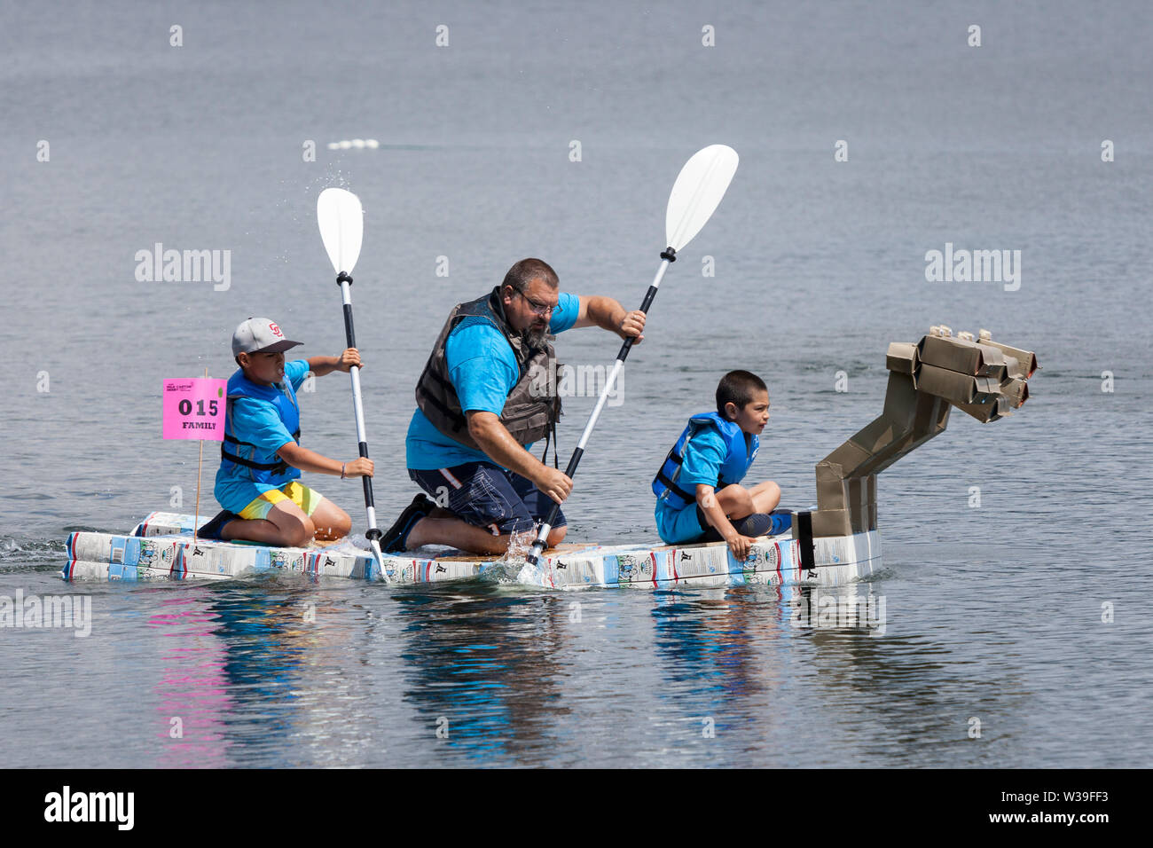 Participants race in the family category of the Seafair Milk Carton ...