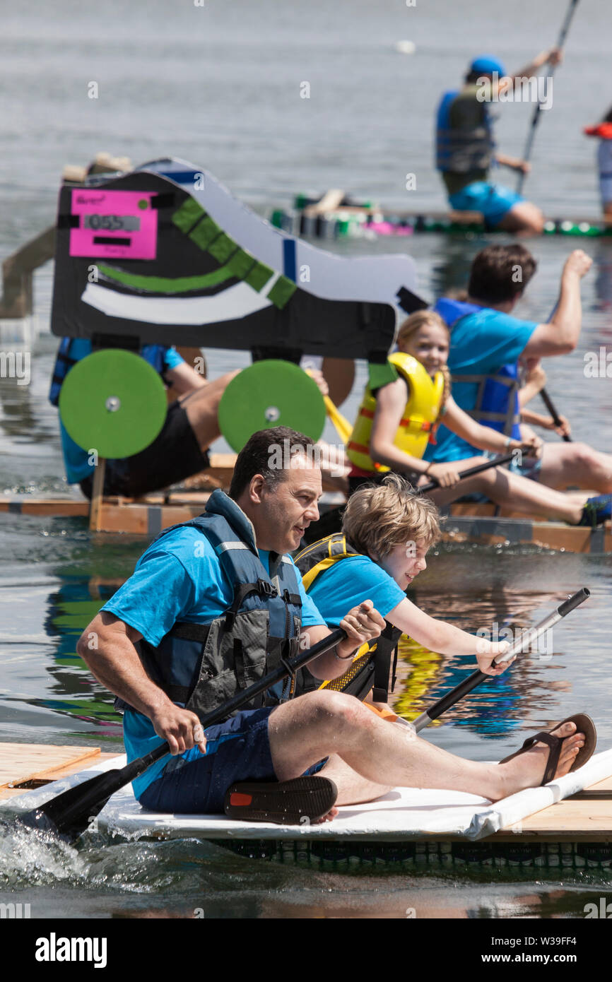 Participants race in the family category of the Seafair Milk Carton ...