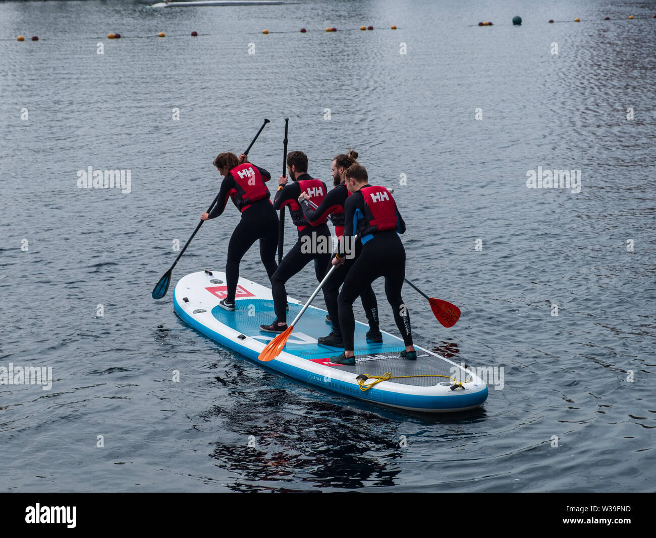 Stand up paddleb boarding hi-res stock photography and images - Alamy