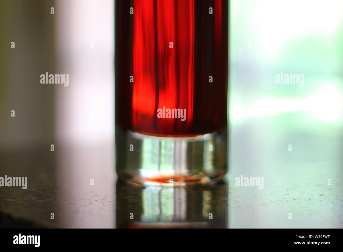 Red Liqueur Bottle Stock Photo - Alamy