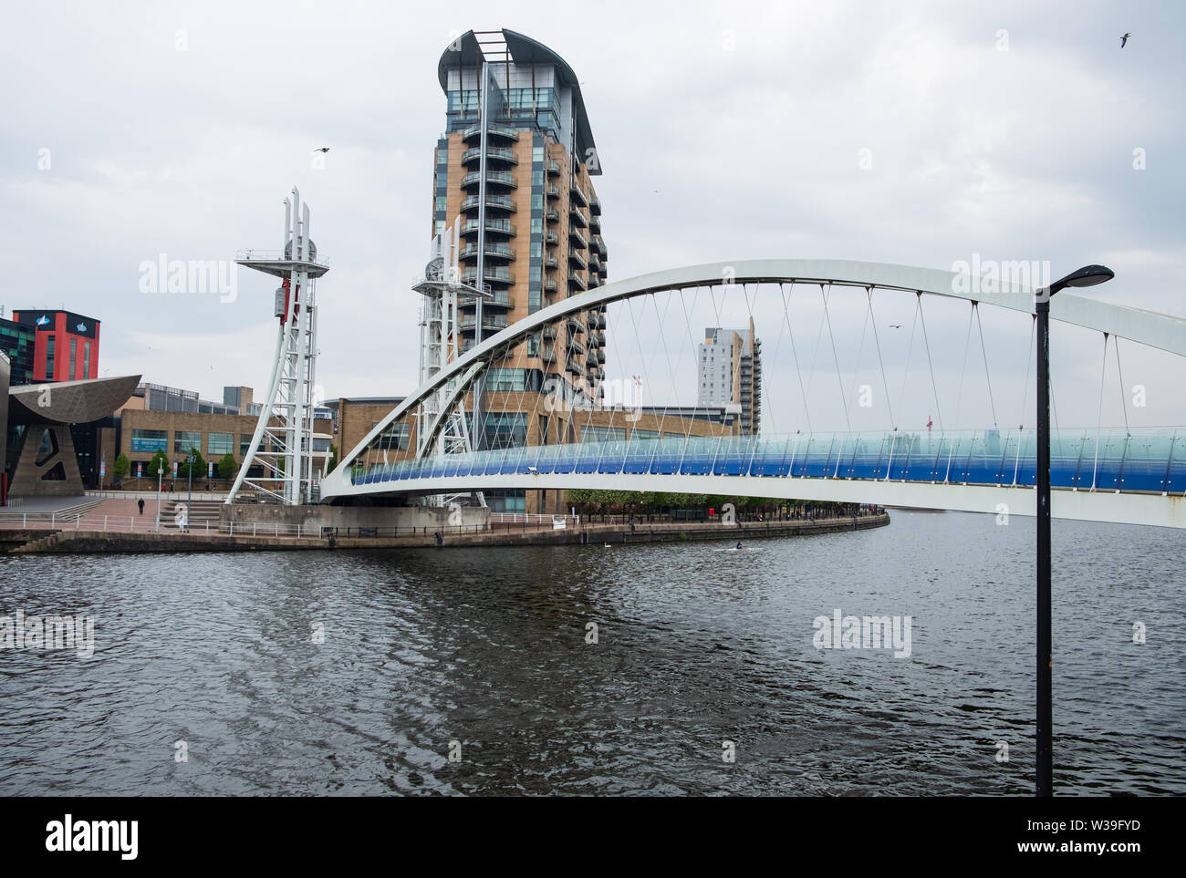 Manchester, United Kingdom - April 24, 2019: Millenium bridge at the ...
