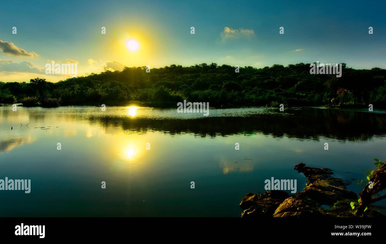 Sun reflected on the river Stock Photo - Alamy