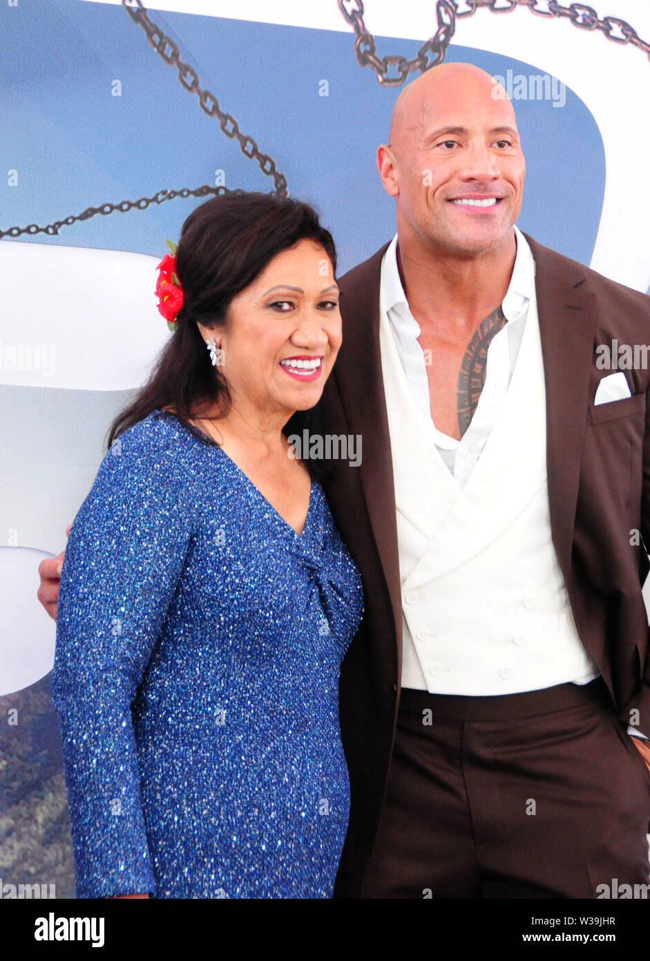 Hollywood, California, USA 13th July 2019 Actor Dwayne Johnson and mother Ata Johnson attend the ...