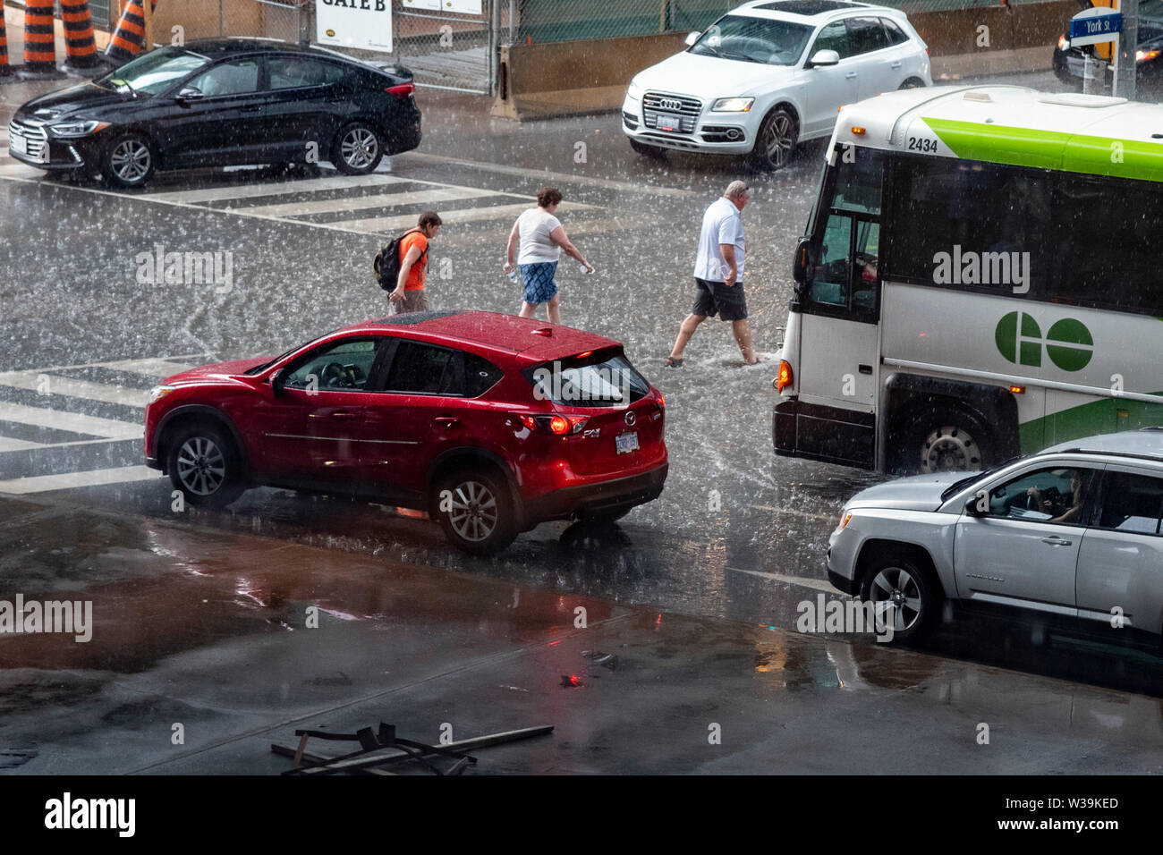 Toronto, Canada. July 13, 2019. Heavy afternoon rain has left many ...