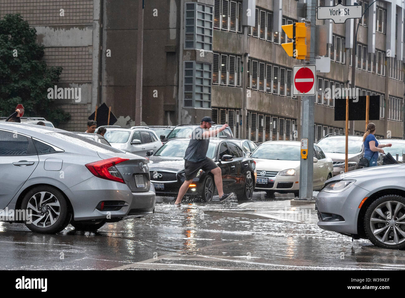 Toronto, Canada. July 13, 2019. Heavy afternoon rain has left many ...