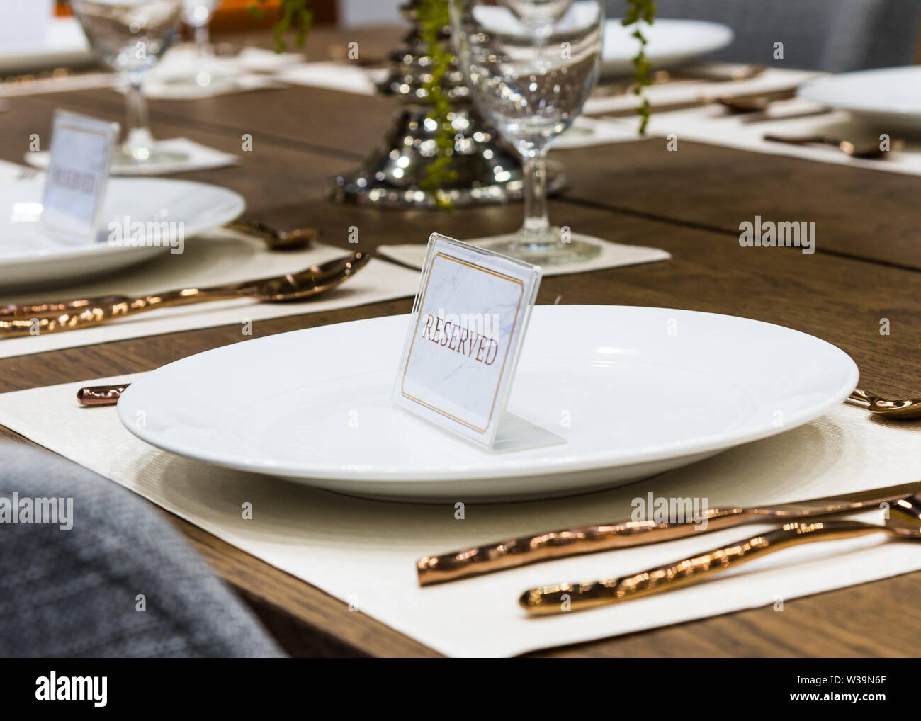 Reservation on a dinner table at the restaurant, plate reserve Stock ...