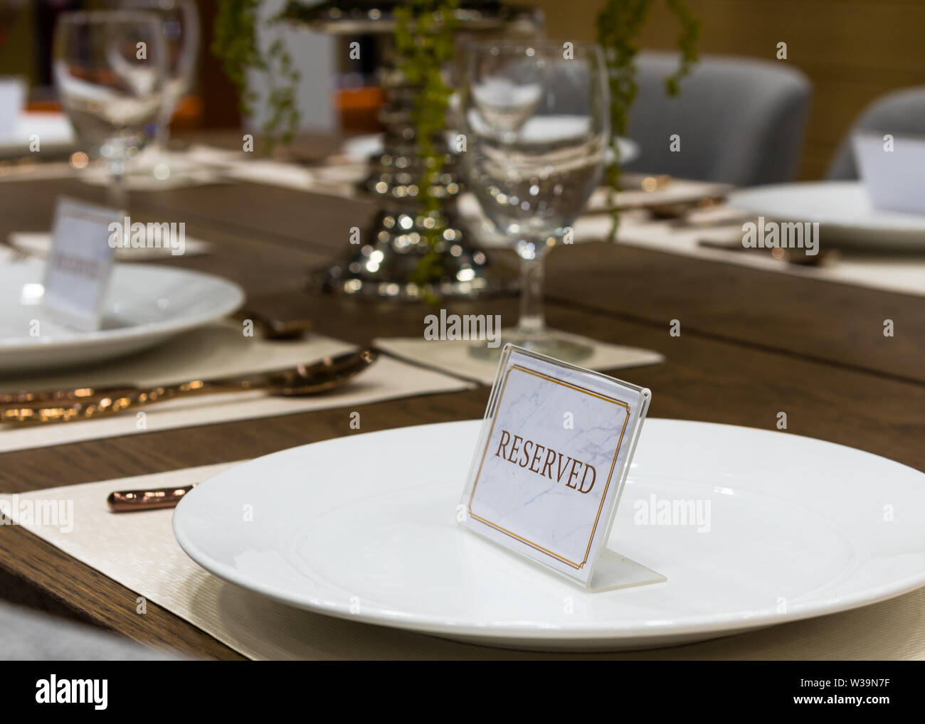 White flower on conference table hi-res stock photography and images ...