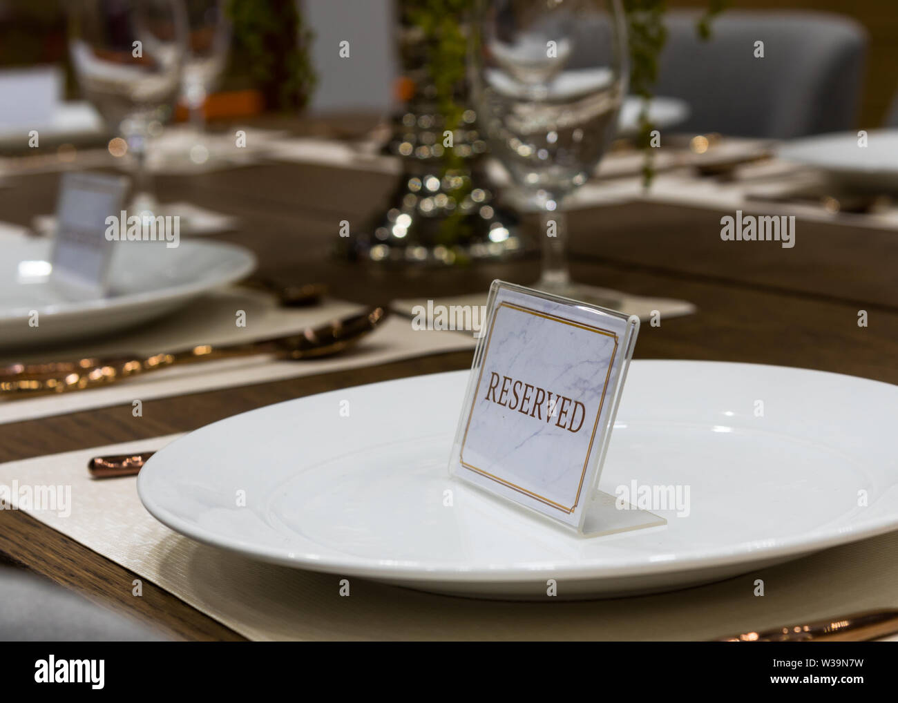 Reservation on a dinner table at the restaurant, plate reserve Stock ...