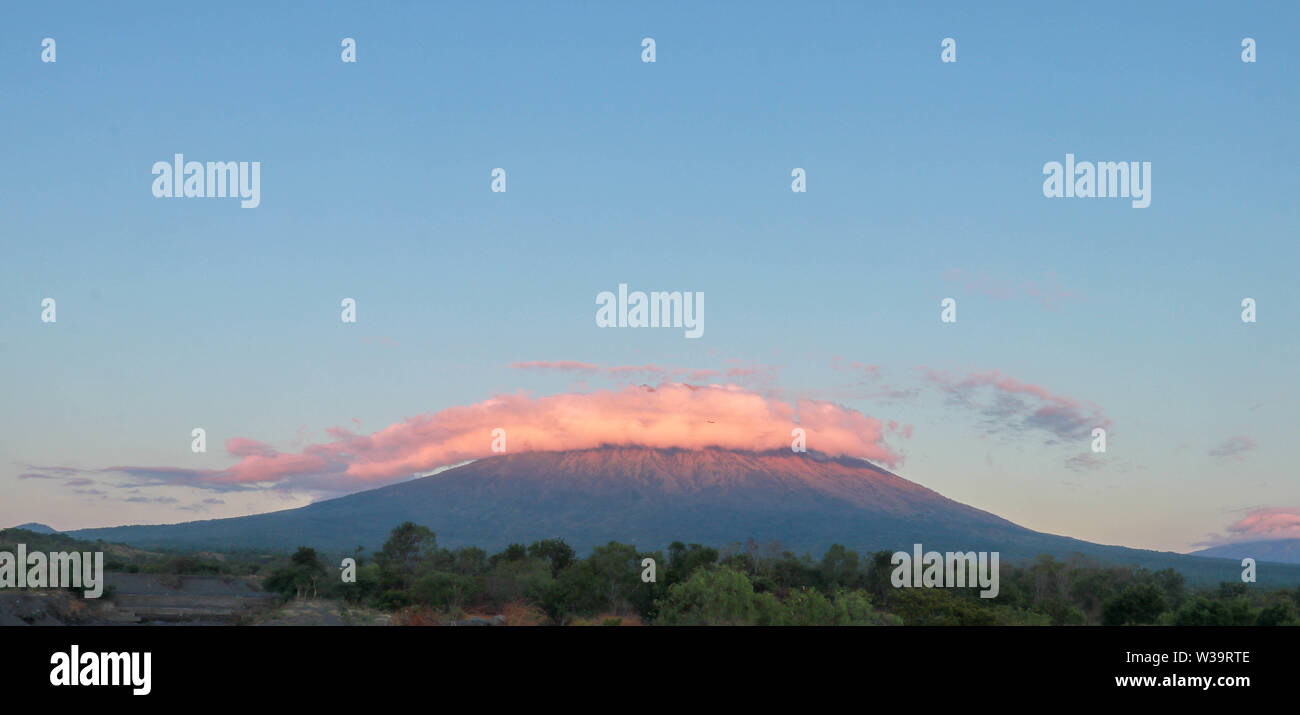 Mountain range and active volcano at dawn hi-res stock photography and ...