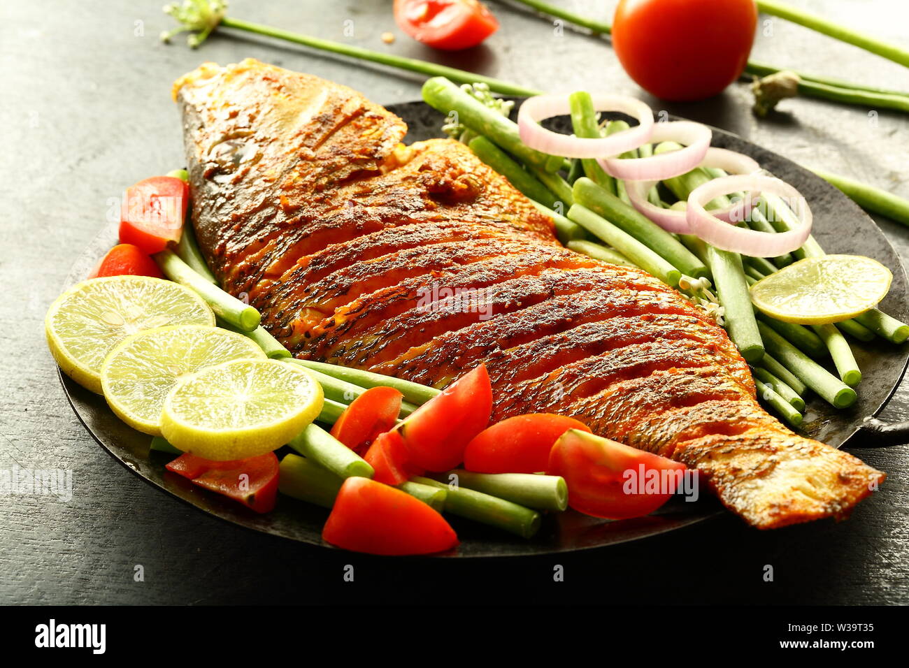 Fish served with salad hi-res stock photography and images - Alamy