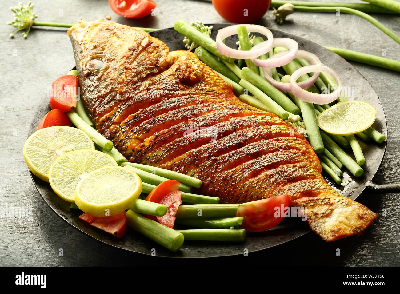 Homemade spicy roasted fish - traditional cooking recipes Stock Photo ...