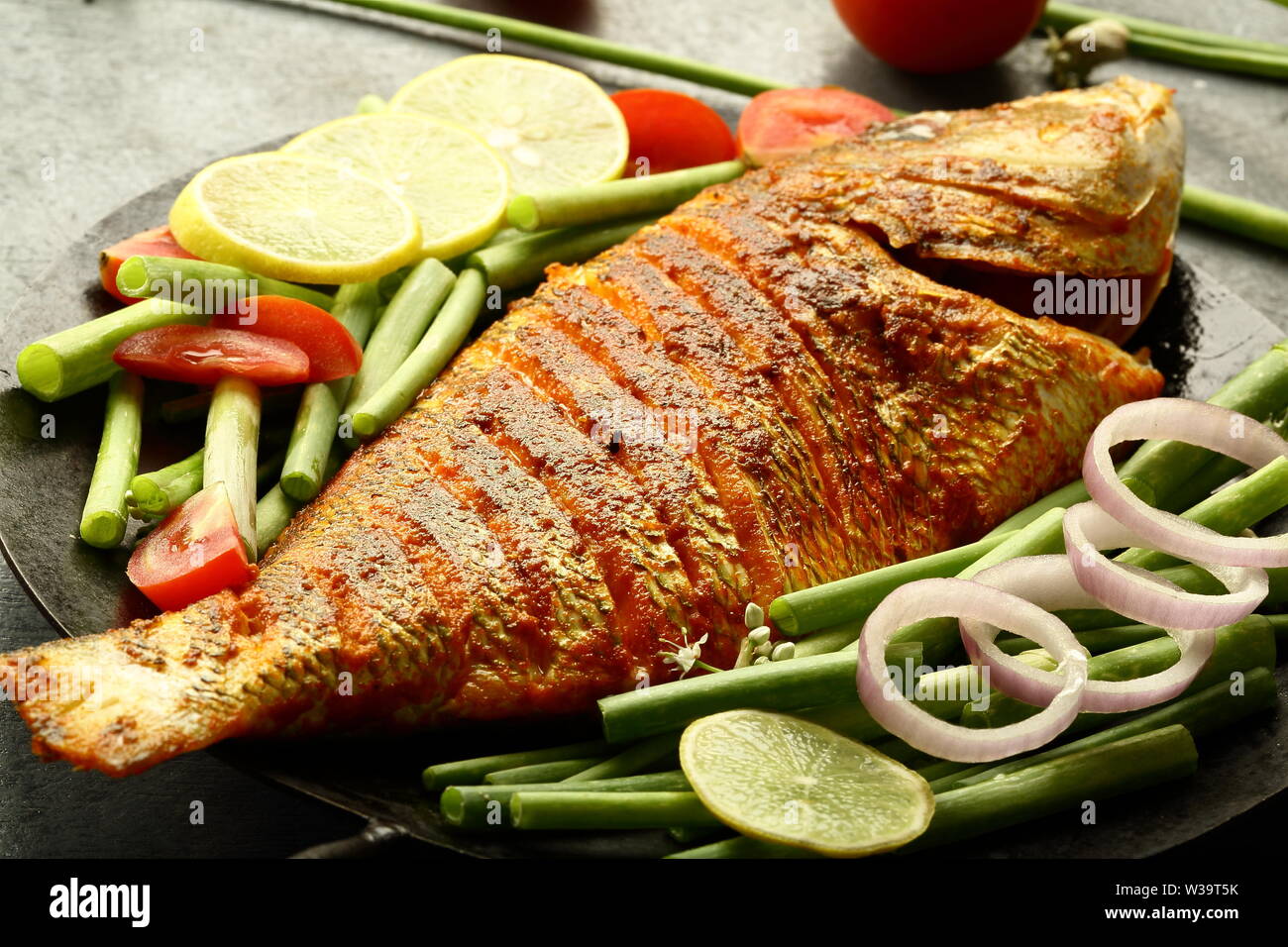 Homemade spicy roasted fish - traditional cooking recipes Stock Photo ...