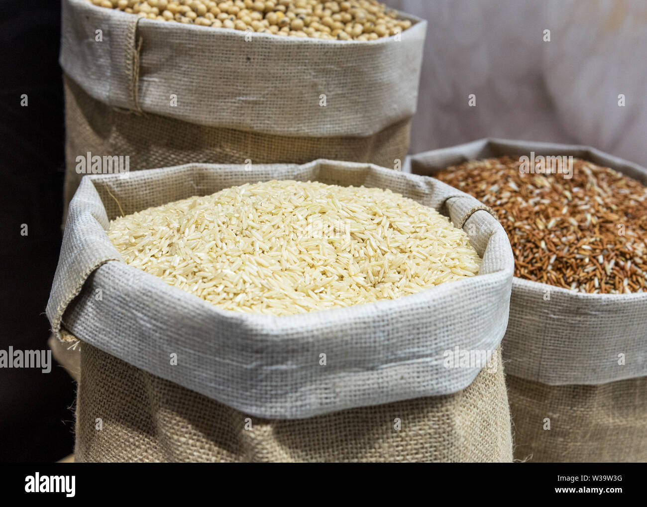 Rice grain in hemp sack, Jasmine rice, Brown rice, Red rice Stock Photo ...